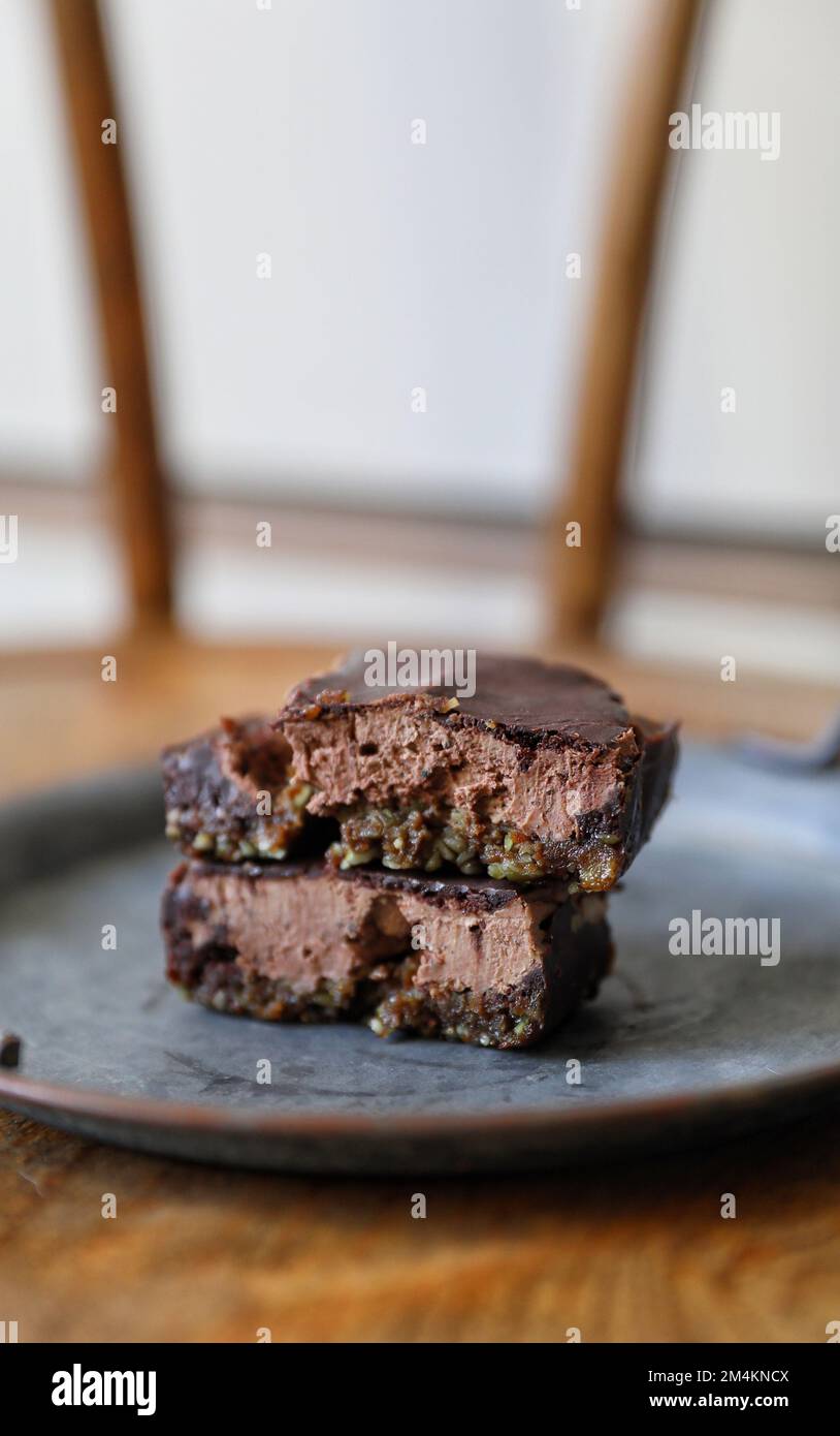 A closeup shot of the raw vegan chocolate cake made with peanut butter ...