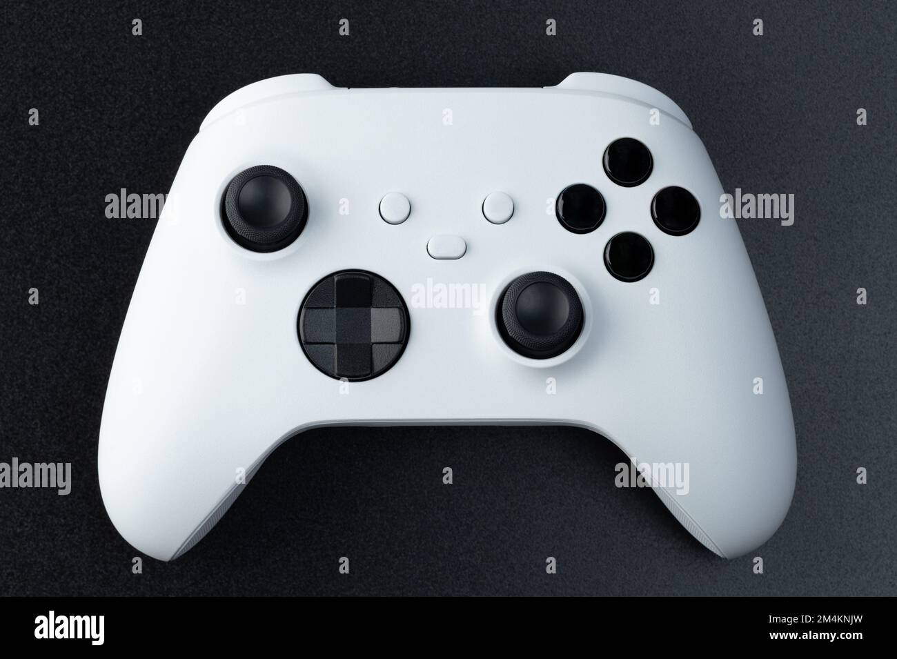 White game controller joystick on black background isolated Stock Photo ...