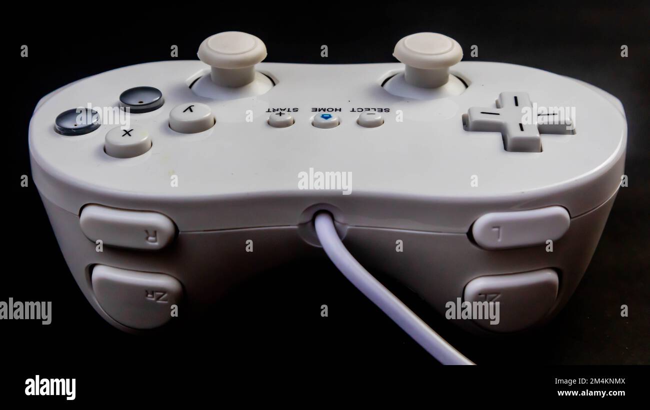 white joystick isolated on black background Stock Photo - Alamy