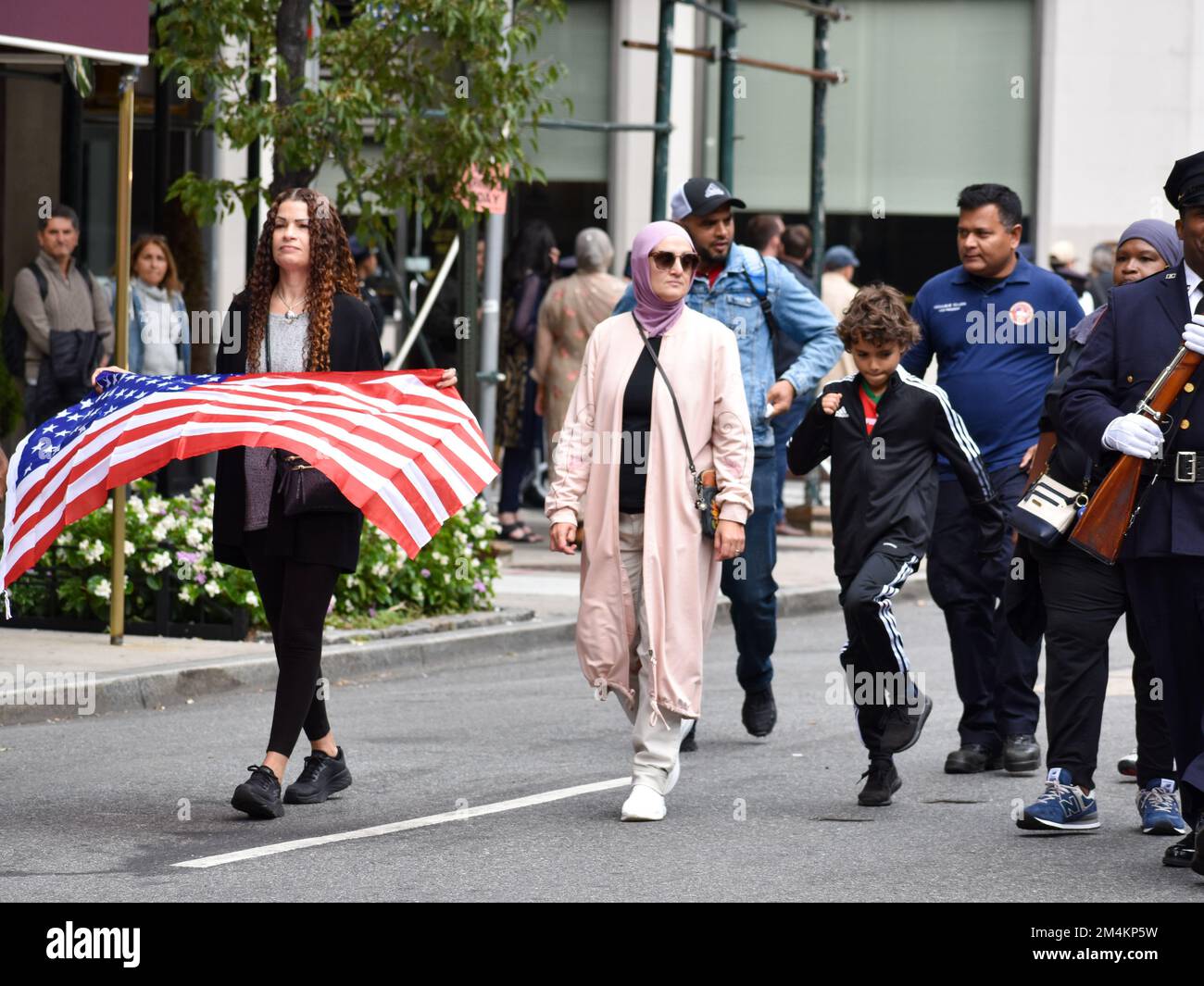 Muslim New Yorkers march along Madison Avenue in New York City during ...