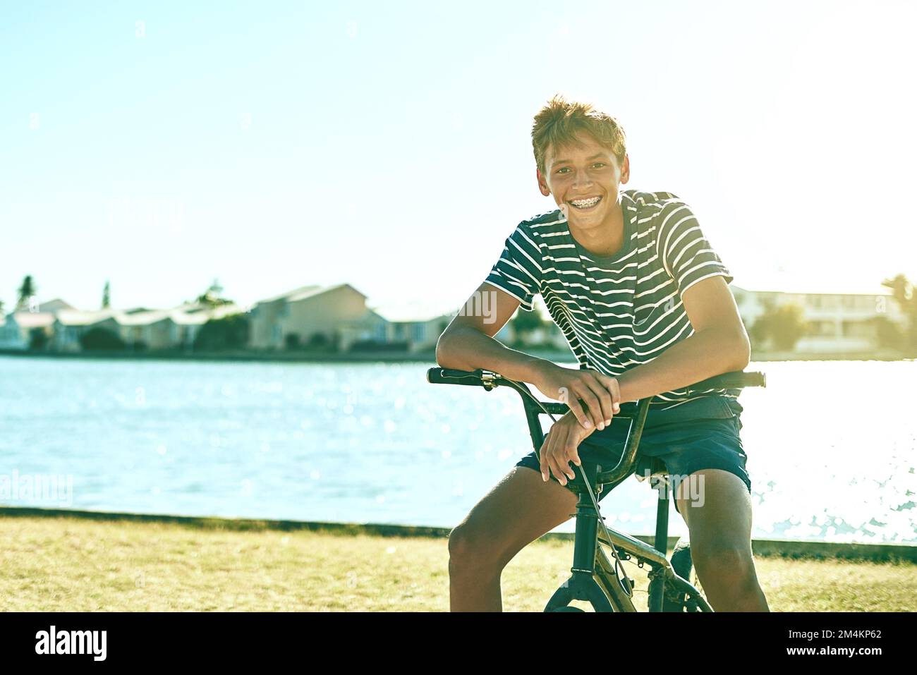 Its the perfect day for a bike ride. Cropped portrait of a young boy ...