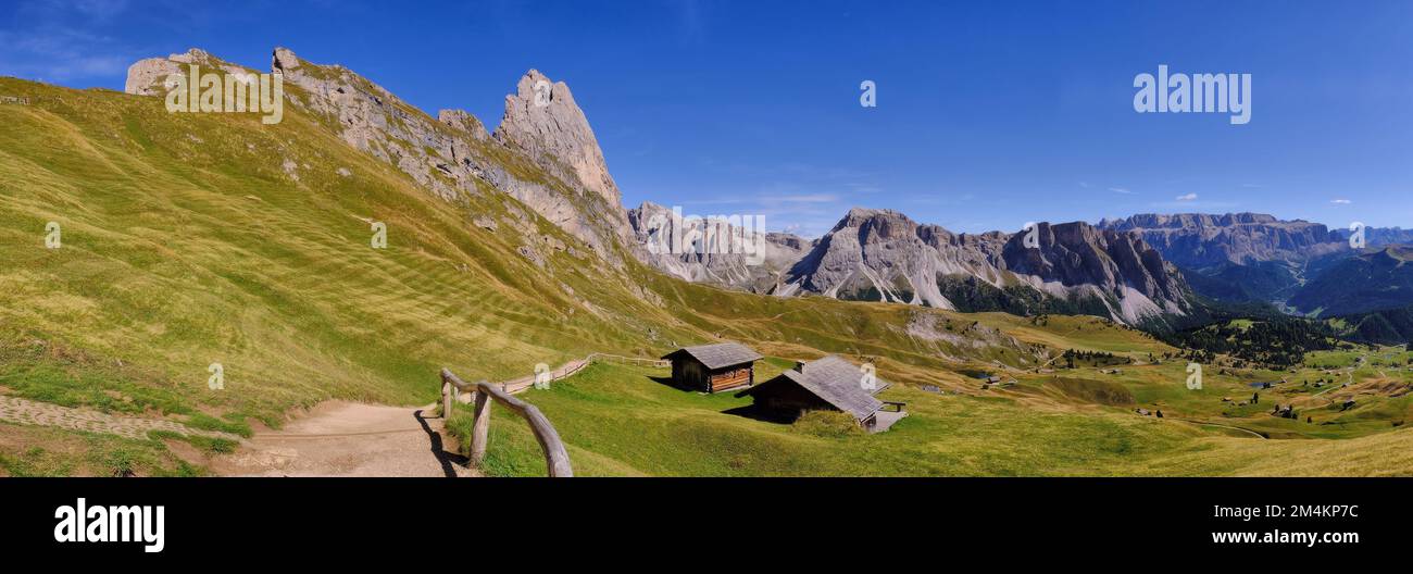 Panorama of Geislerspitzen massif on Seceda with walking path, grass ...