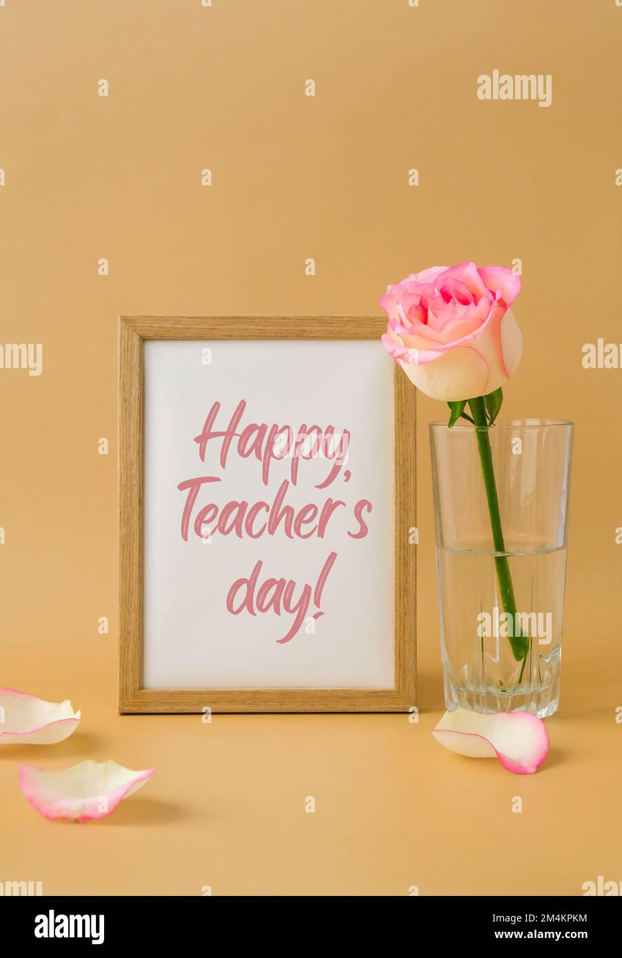 Wooden frame with greeting card text HAPPY TEACHERS DAY delicate pink ...