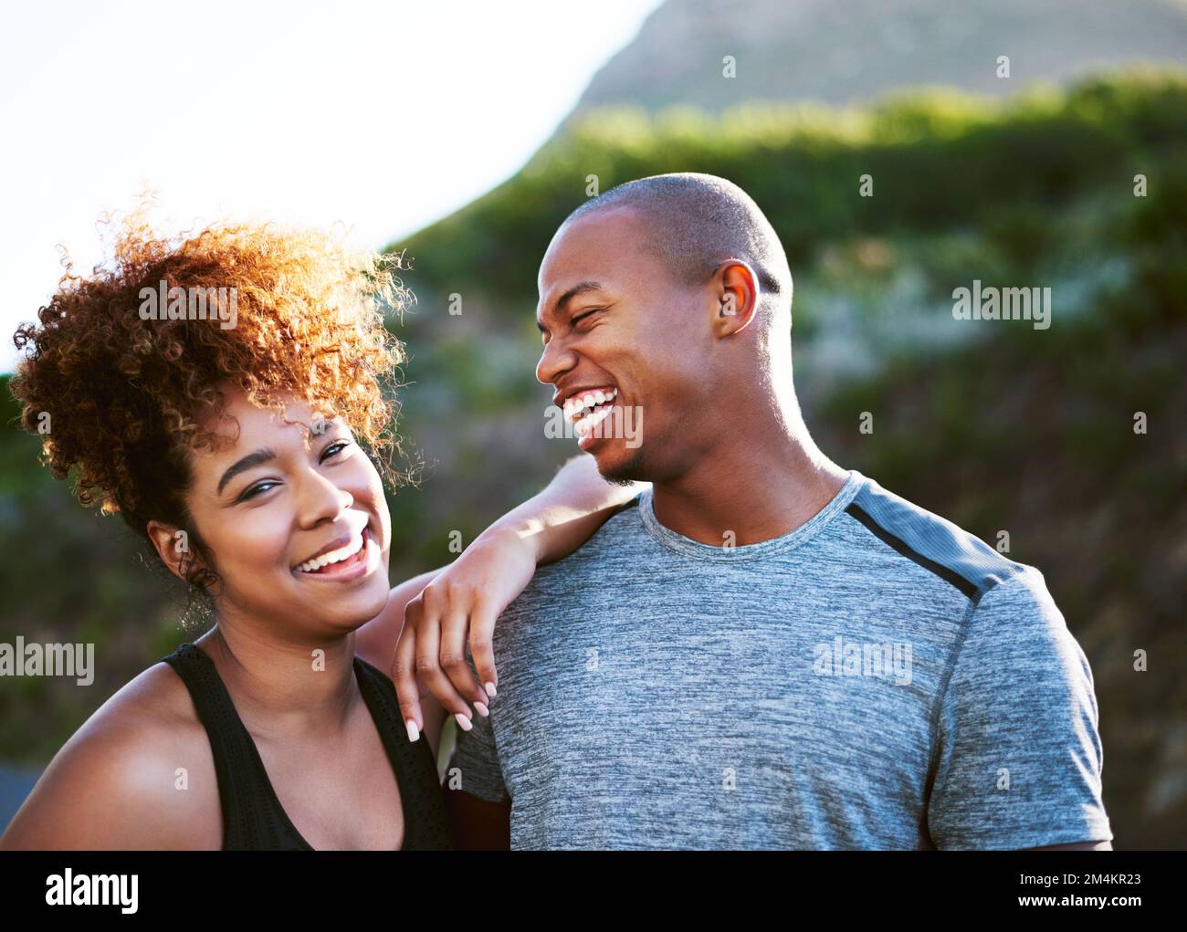 Man woman running young laughing hi-res stock photography and images ...