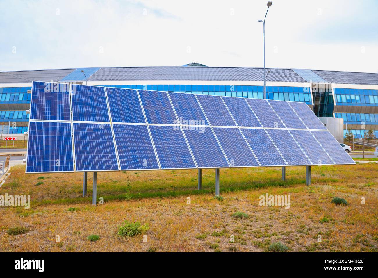 Ground mounted Solar power photovoltaic panels on grass in city, clean ...
