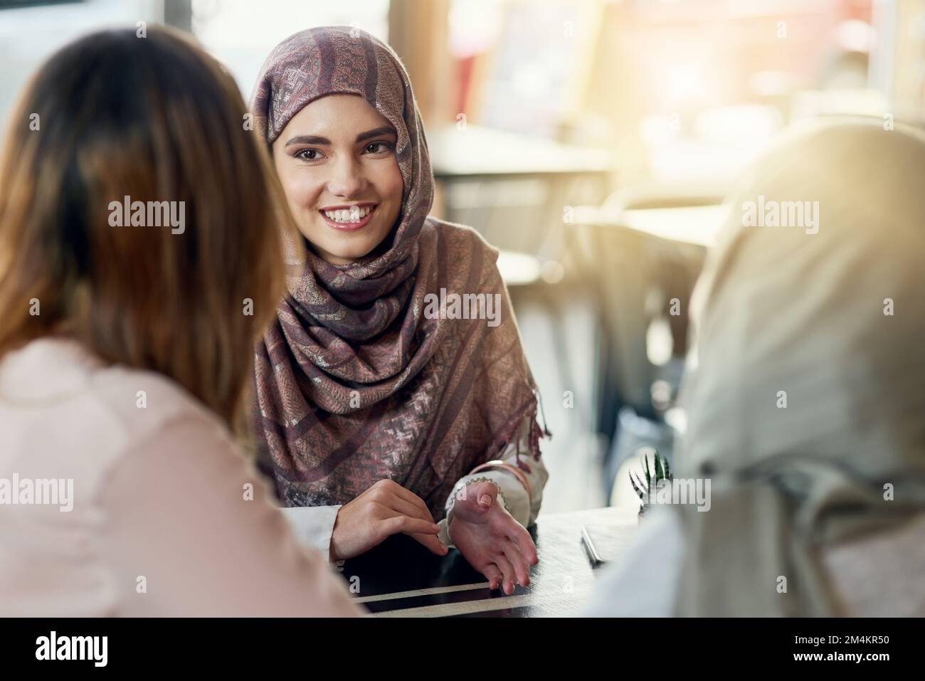 Group friends chatting in cafe hi-res stock photography and images - Alamy