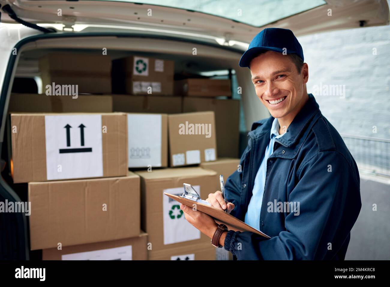 Your package is safe and on its way. a handsome young delivery man ...