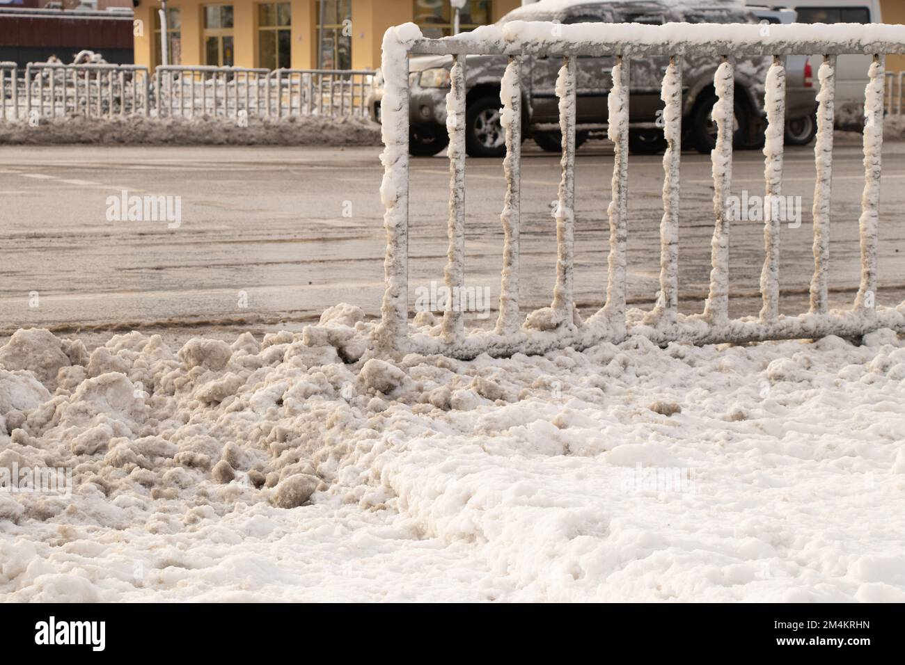 frozen snow from ice on a city street in winter in Ukraine Stock Photo ...