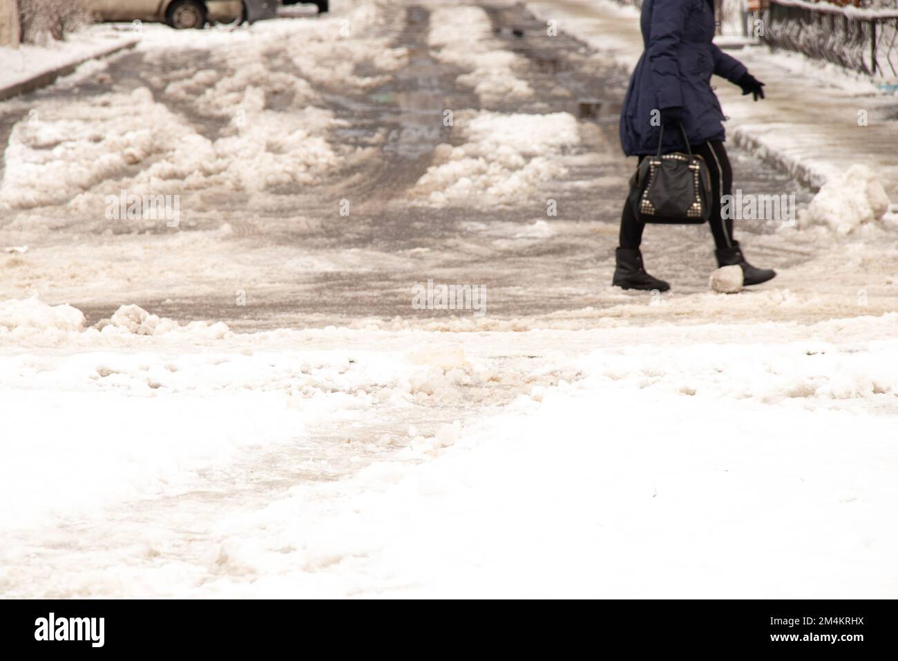 frozen snow from ice on a city street in winter in Ukraine Stock Photo ...