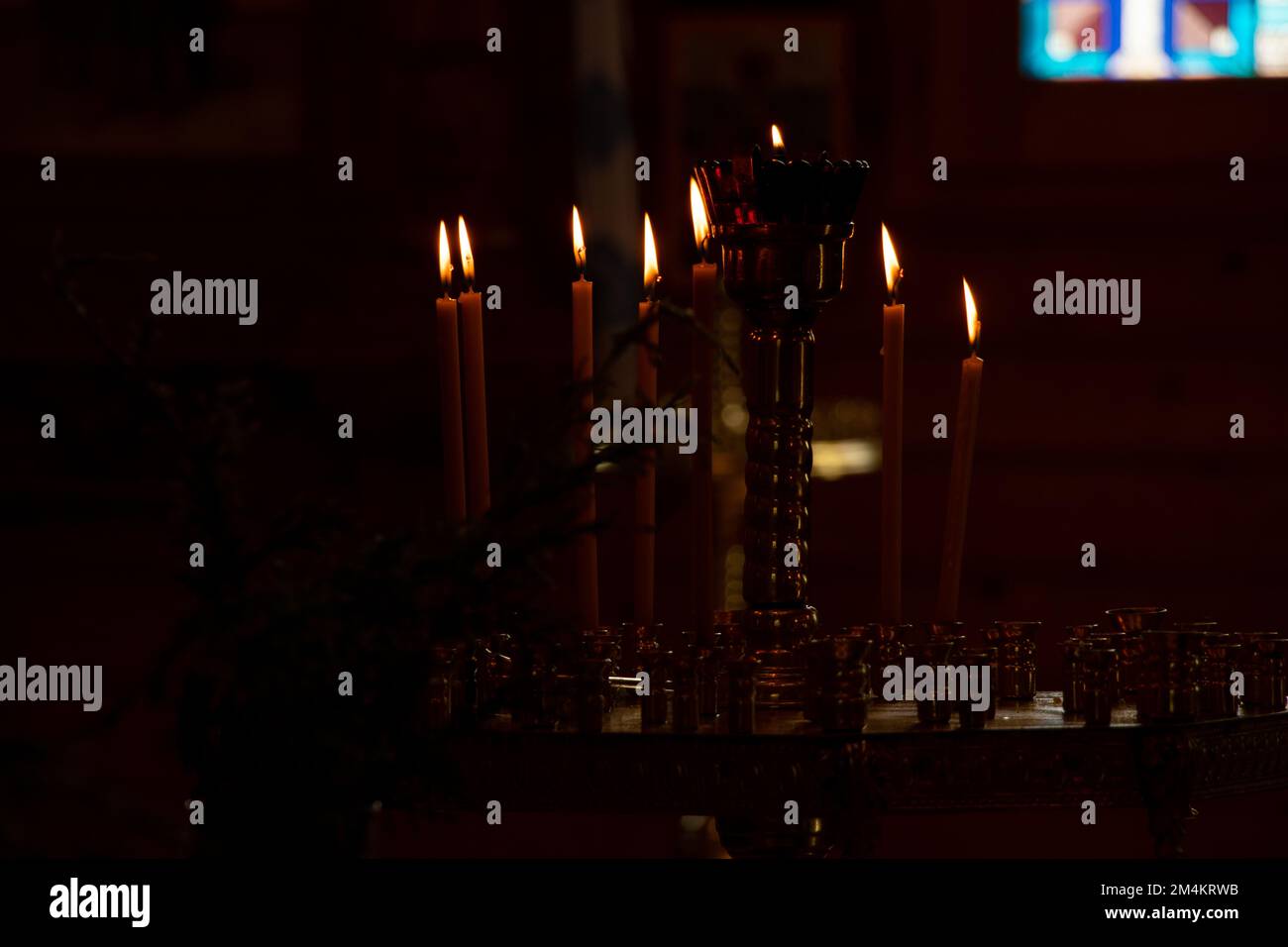 candle flame in the dark in the church, burning candle, religion Stock ...