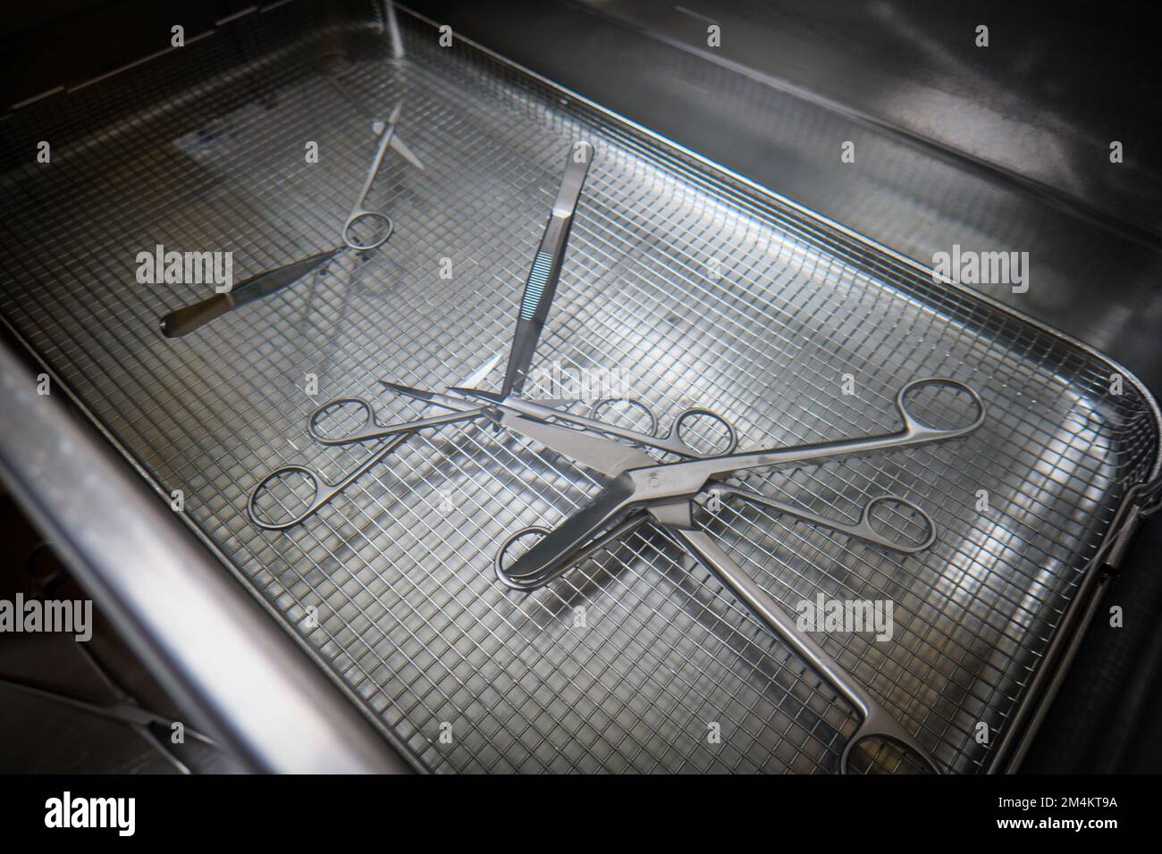 various surgical instruments are cleaned in an ultrasonic bath Stock ...