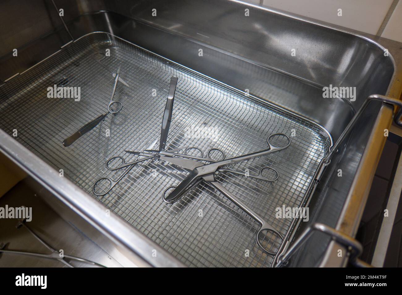 various surgical instruments are cleaned in an ultrasonic bath Stock ...