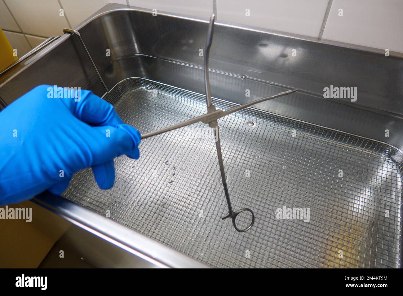 a surgical instrument is placed in an ultrasonic bath Stock Photo - Alamy