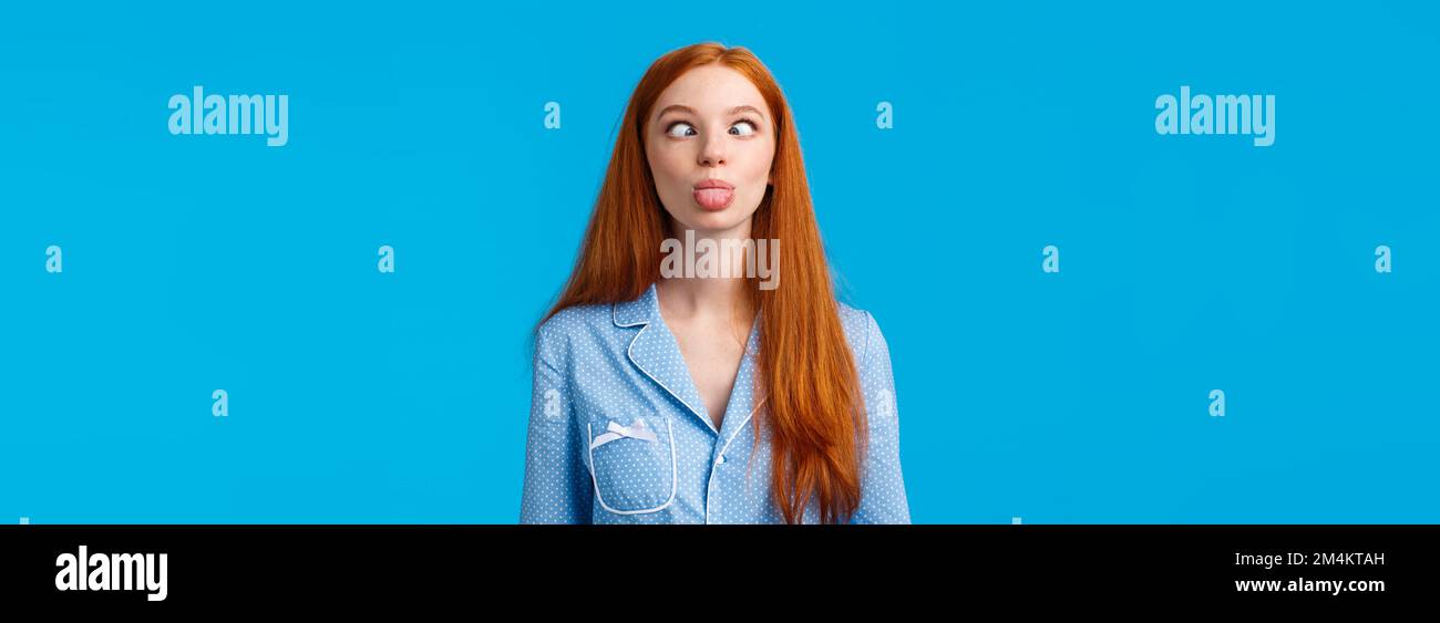 Be funny and silly. Redhead carefree and enthusiastic caucasian girl ...