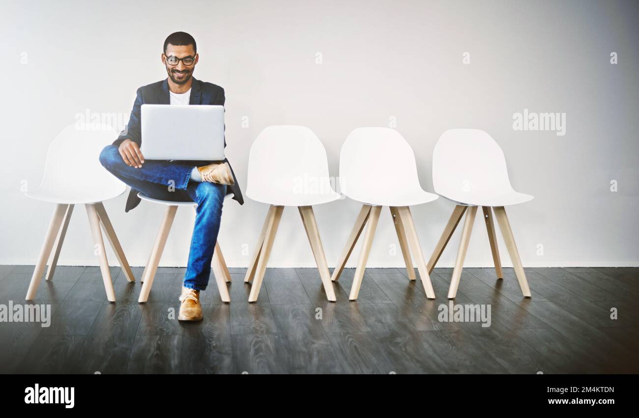 Getting some information and advice for his interview. a young ...
