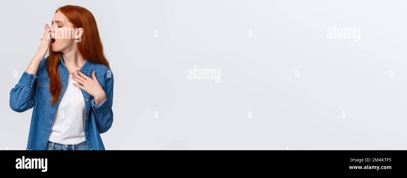 Waist-up portrait lovely redhead girl want sleep, feeling tired or ...