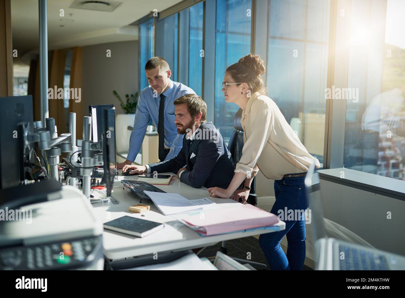 Three heads are better than one. Full length shot of three young ...