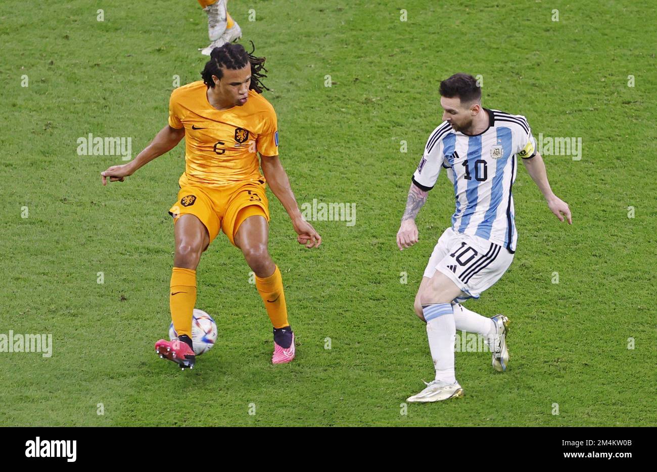 Argentina's Lionel Messi (R) passes to Nahuel Molina for his opening ...