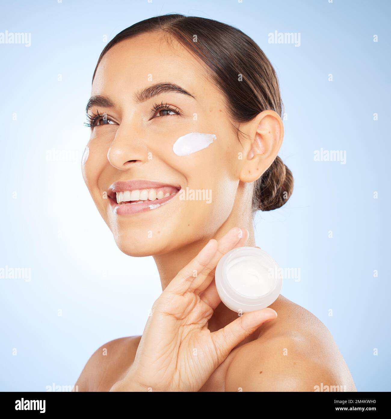 Woman, beauty and face with cream product for happiness vision ...