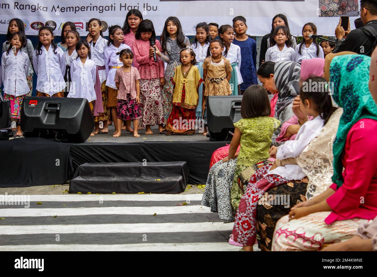 Bandung, West Java, Indonesia. 22nd Dec, 2022. Mothers watching their ...