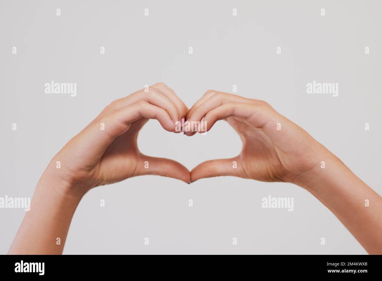 Hands making heart shape in hi-res stock photography and images - Alamy