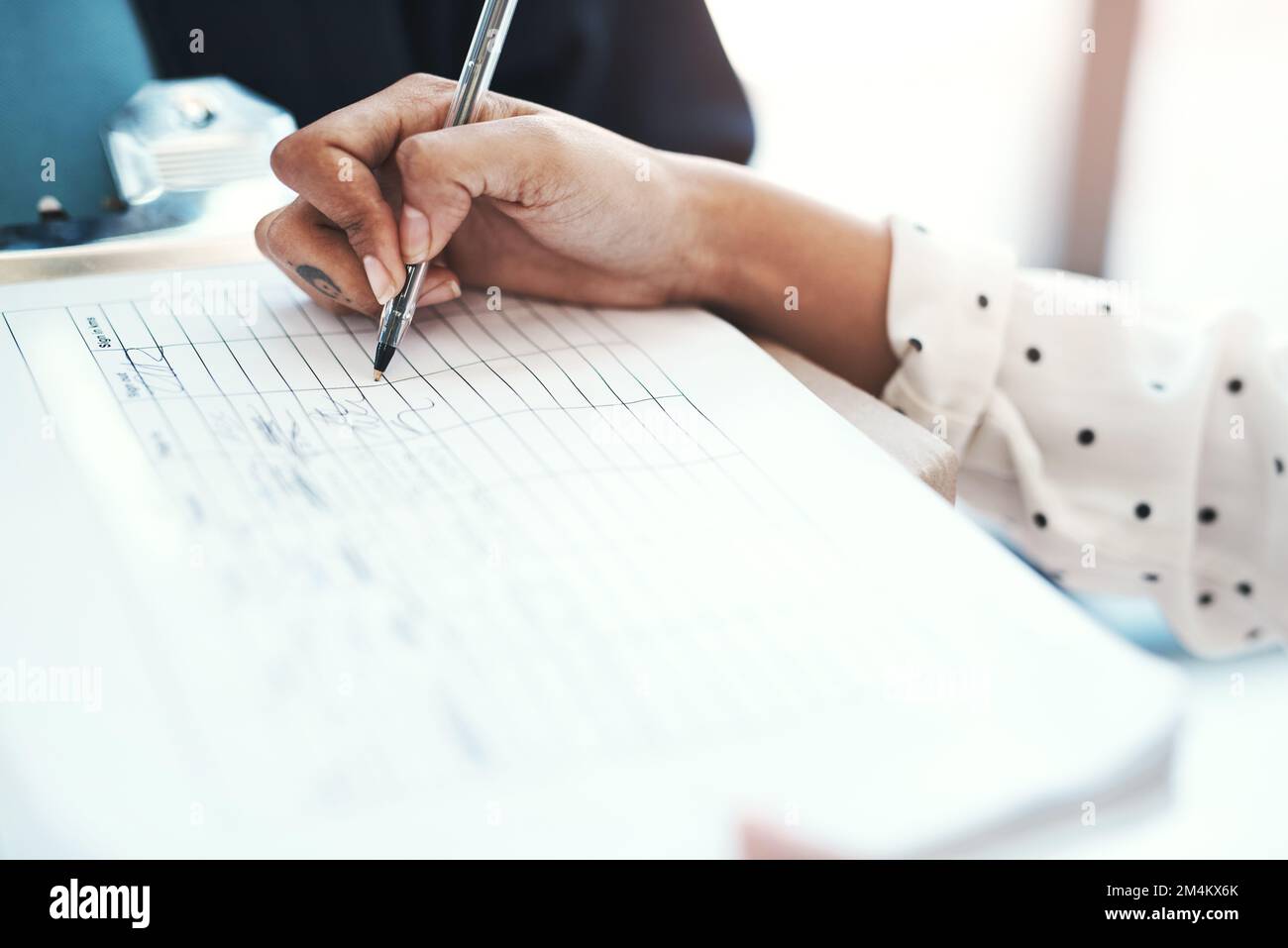 Signing for her package delivered on time. an unrecognizable delivery ...