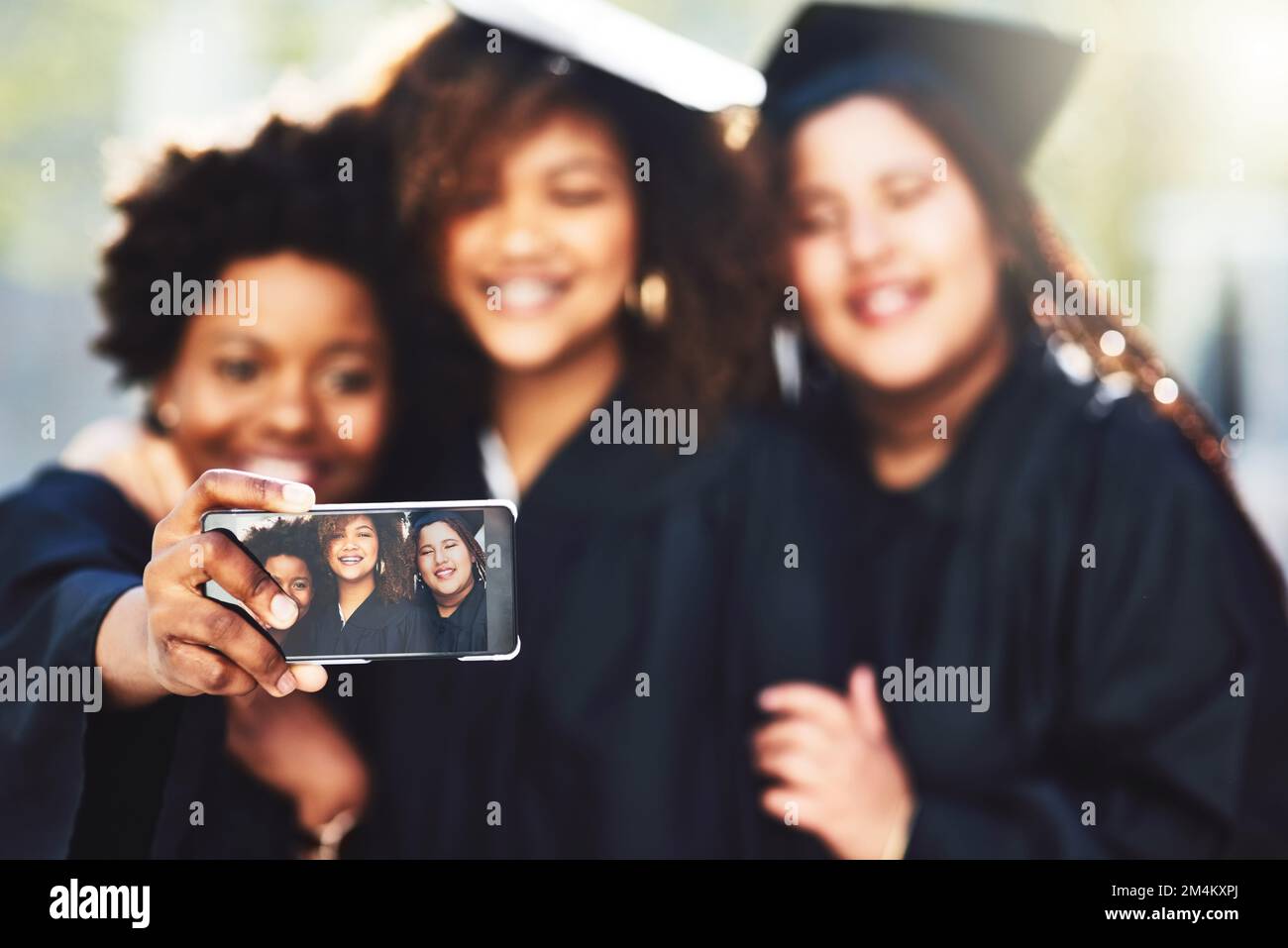 I want to remember my girls just like this. three students taking a ...