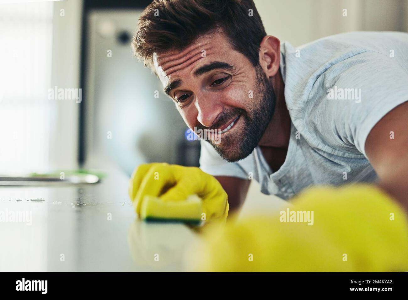Young bearded man cleaning hi-res stock photography and images - Alamy