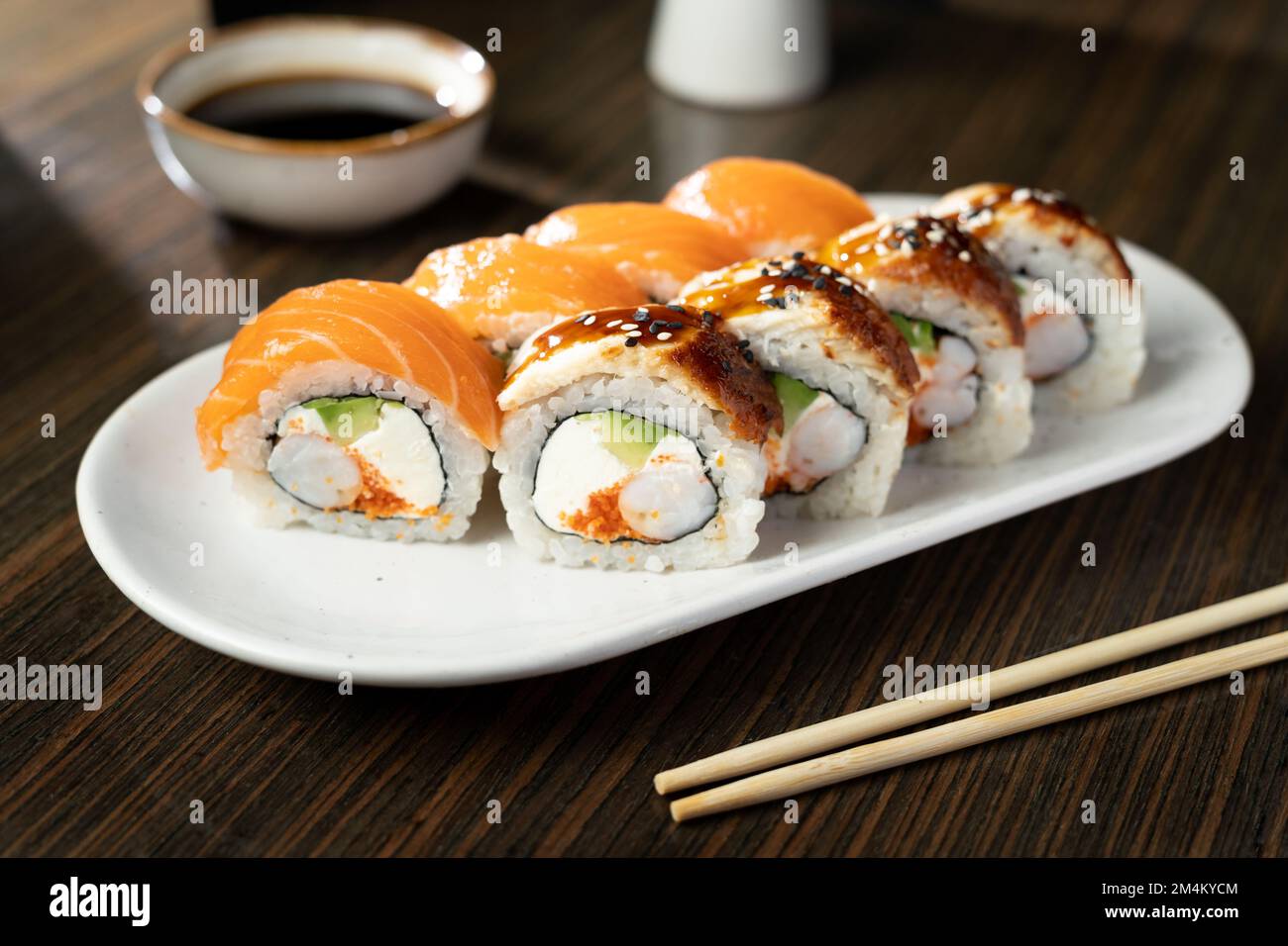 Sushi Roll with salmon, eel, tuna, avocado, royal prawn, cream cheese ...