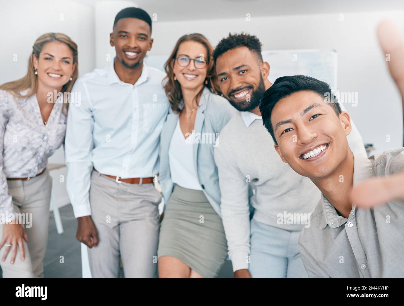 Selfie, collaboration and diversity with business friends posing for a ...