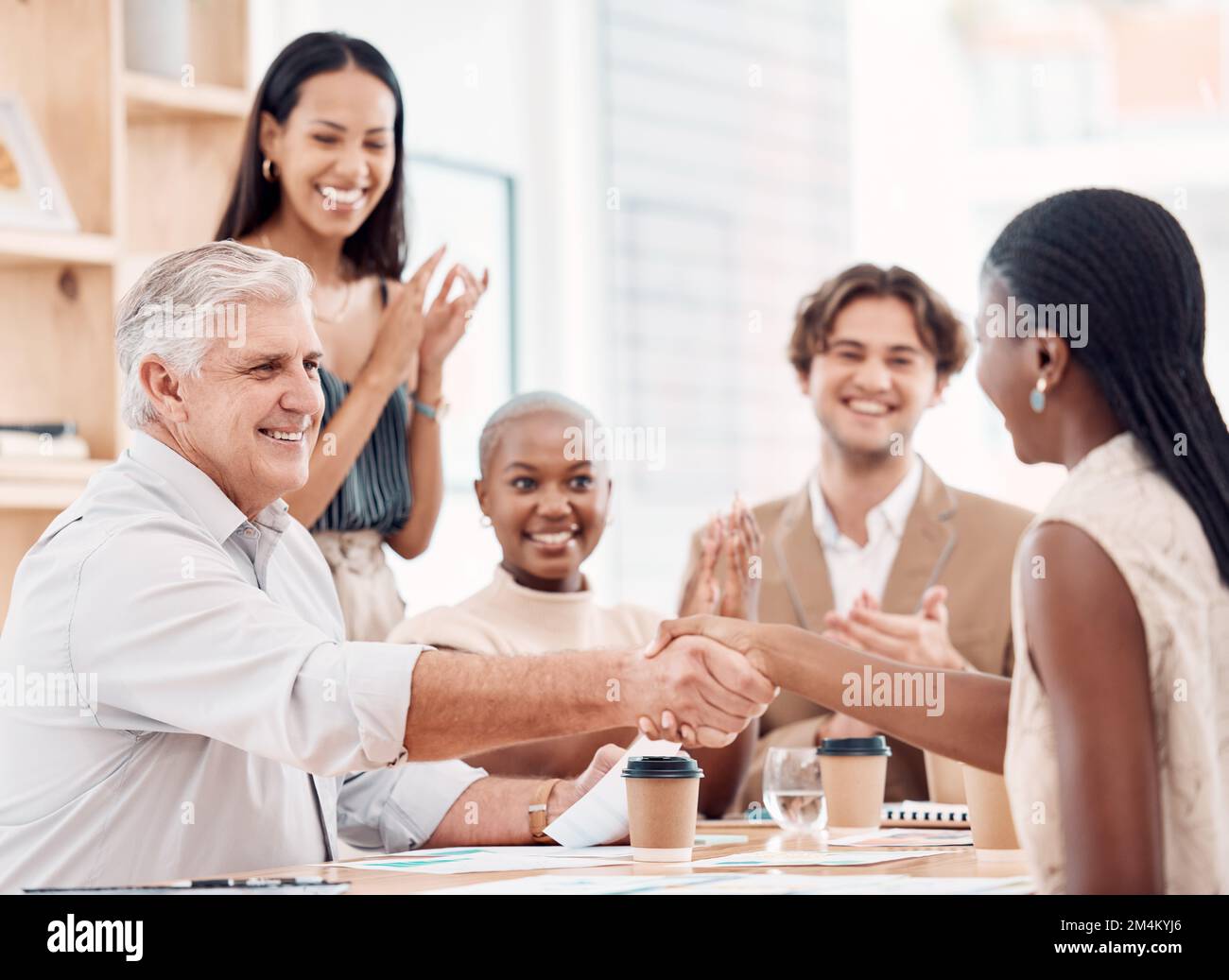 Business woman shaking hands office hi-res stock photography and images ...