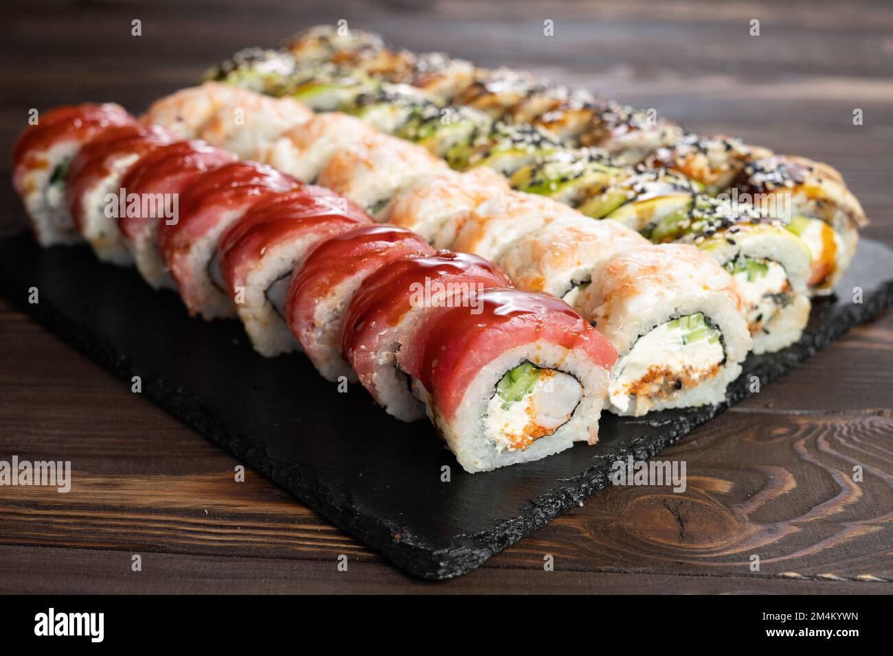 sushi set on the black slate stone, sushi menu, restorant japanese food ...