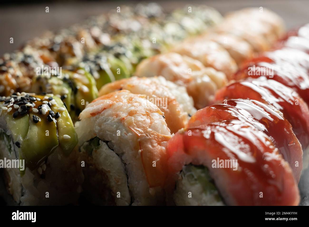 Close up of Japanese sushi set with fresh ingredients on black ...
