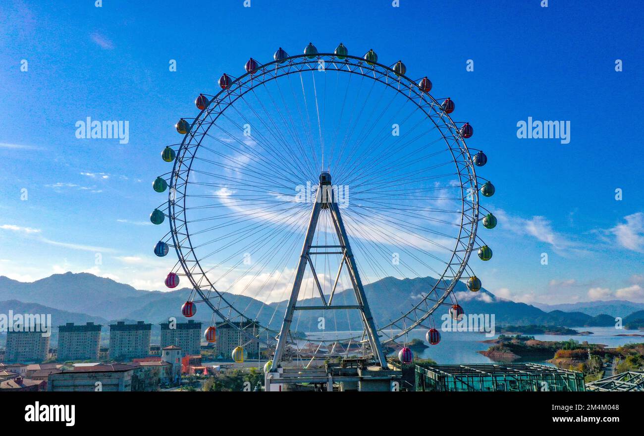 Aerial photo shows the huge ferris wheel above the top of the INTIME ...