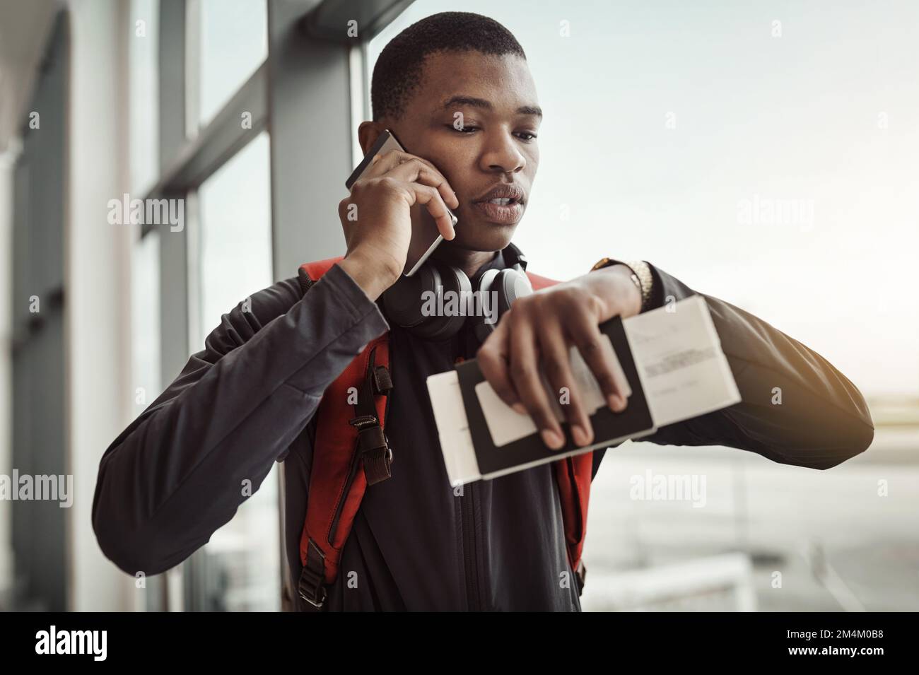 Time is important if you wanna travel the world. a handsome young man ...