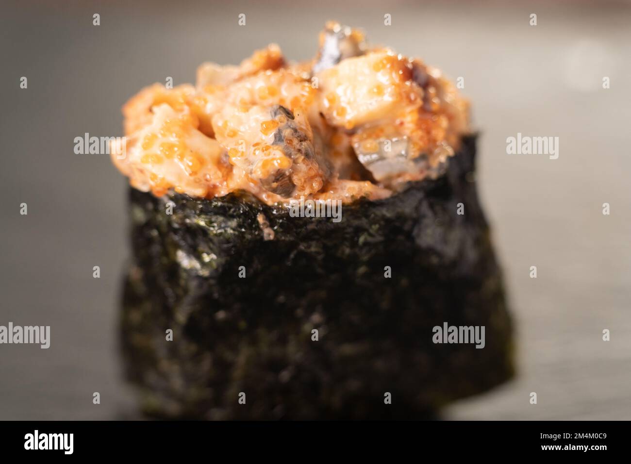 Close up of Gunkan Sushi. Gunkan Maki Sushi with Seafood and Spicy ...