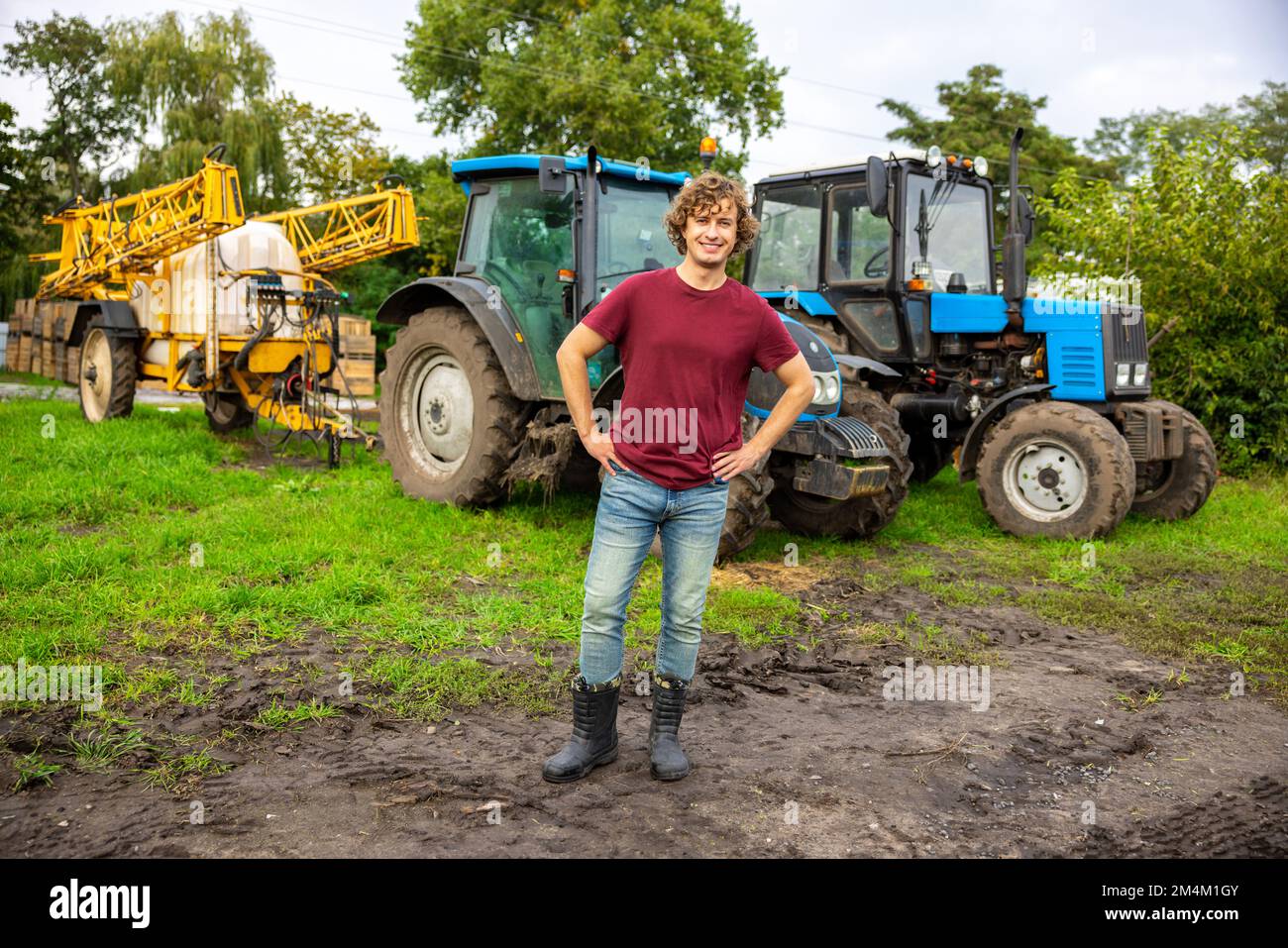 Farmer posing with tractor hi-res stock photography and images - Alamy