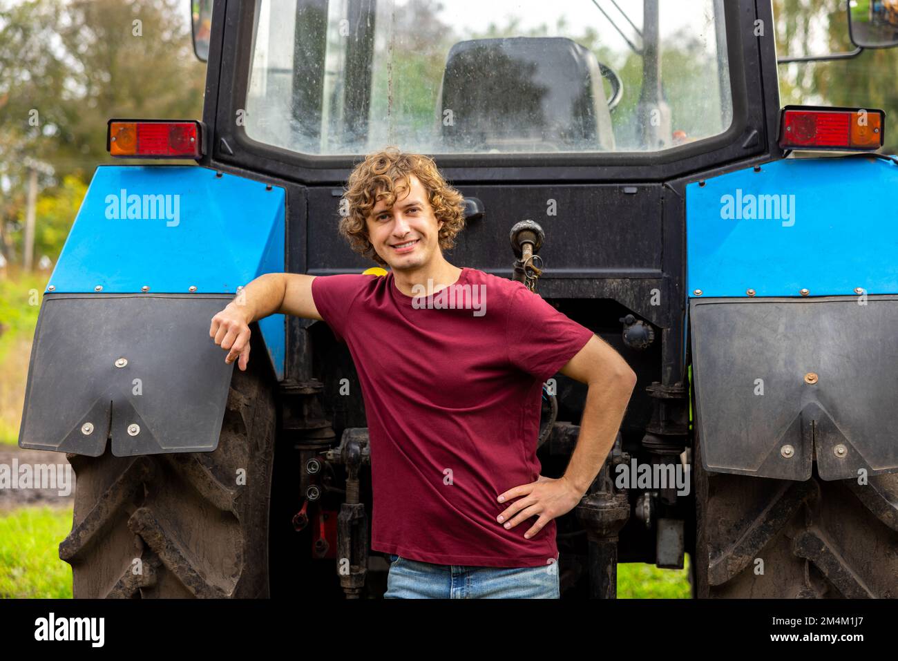 Farmer posing with tractor hi-res stock photography and images - Alamy
