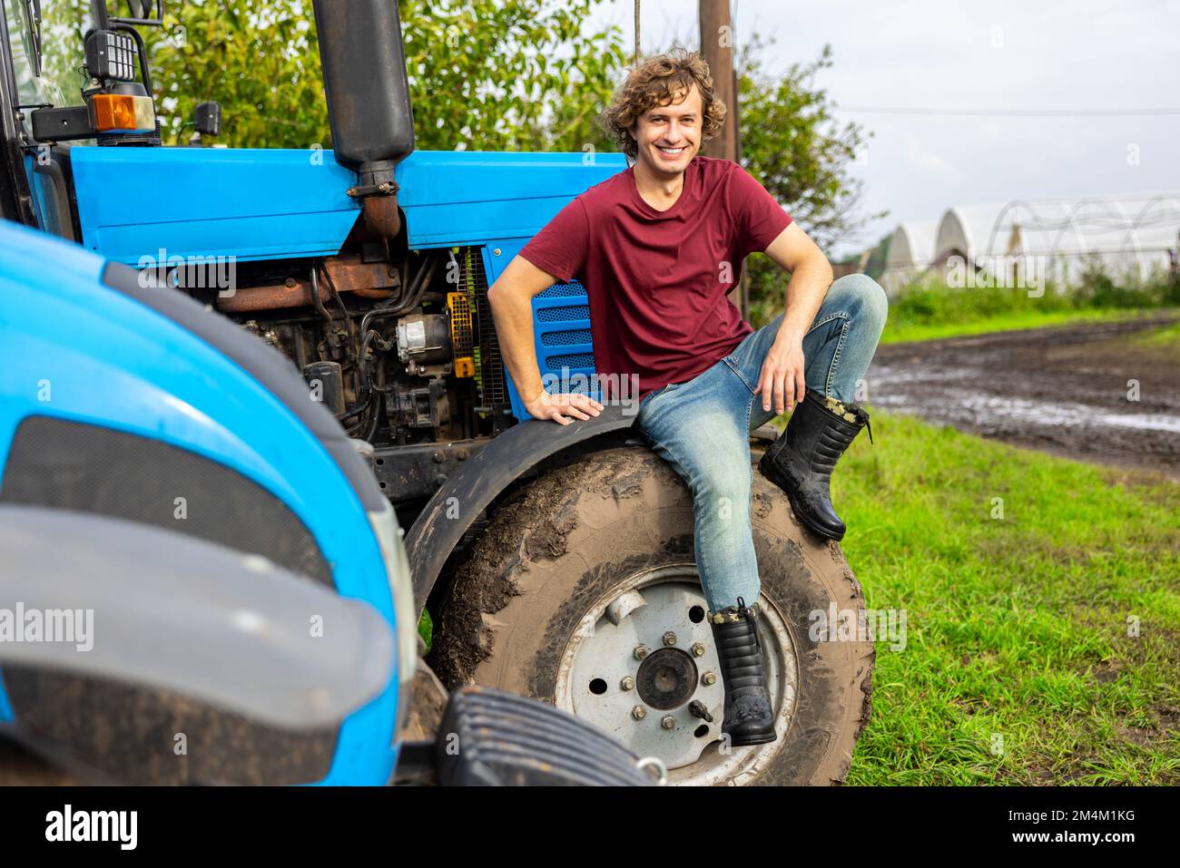 Farmer posing with tractor hi-res stock photography and images - Alamy