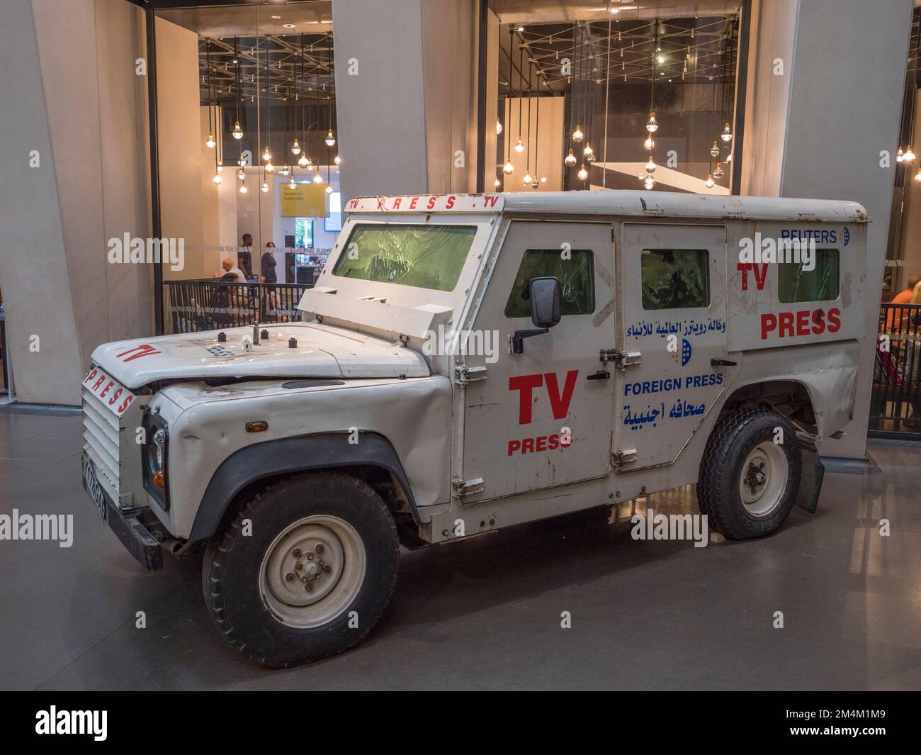 A damaged Reuters "TV PRESS" Land Rover written on it used in the ...