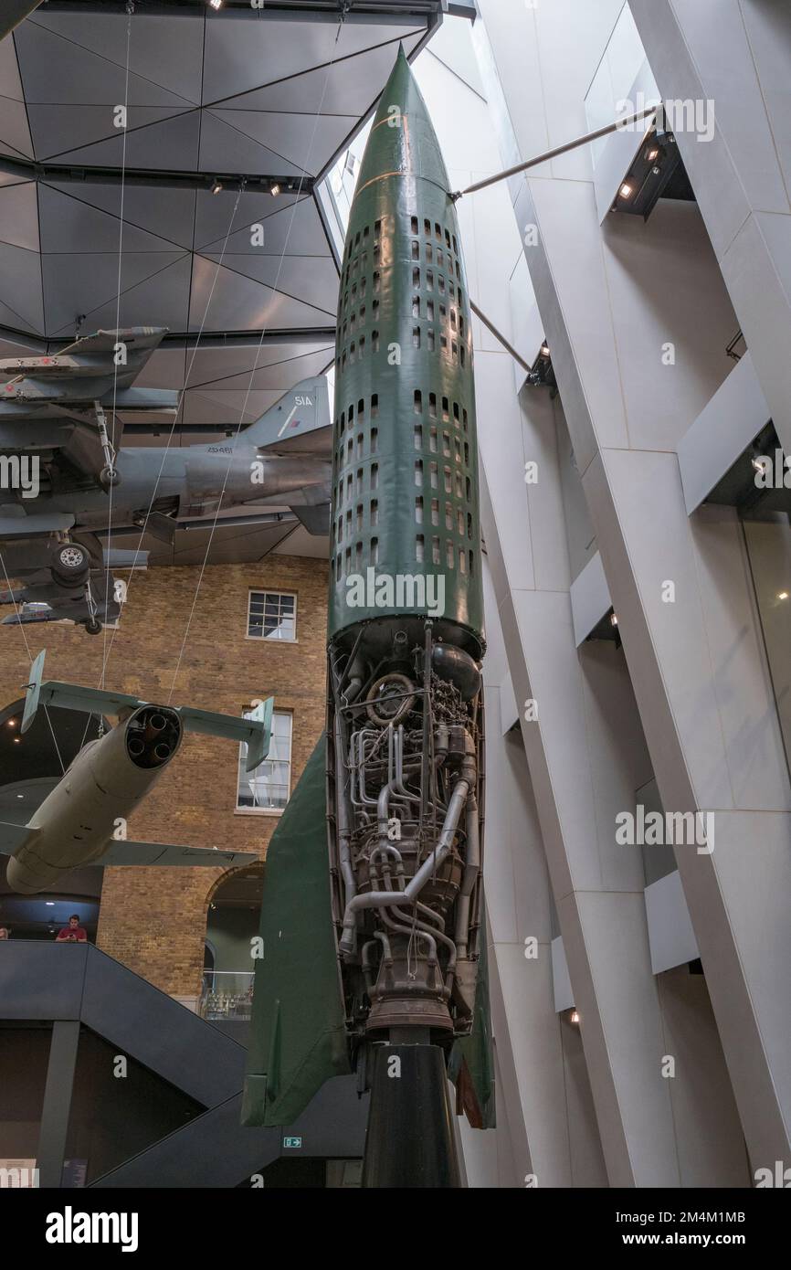 A German V2 World War II rocket standing in the main hall of the Imperial War Museum, London, UK ...