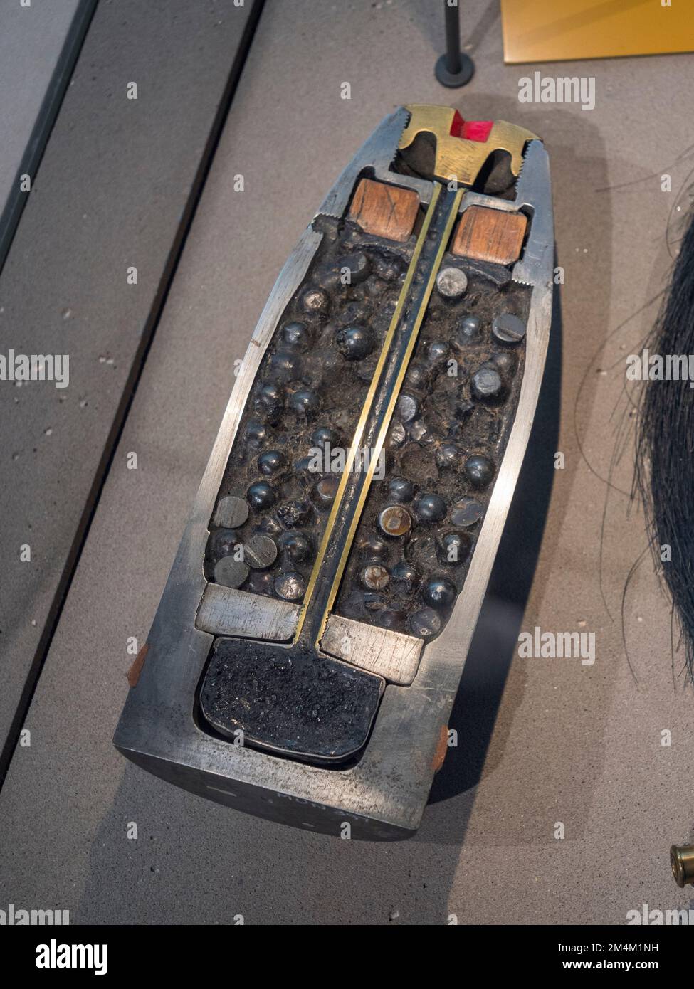 A WWI shrapnel shell cutaway showing the inside in the Imperial War ...