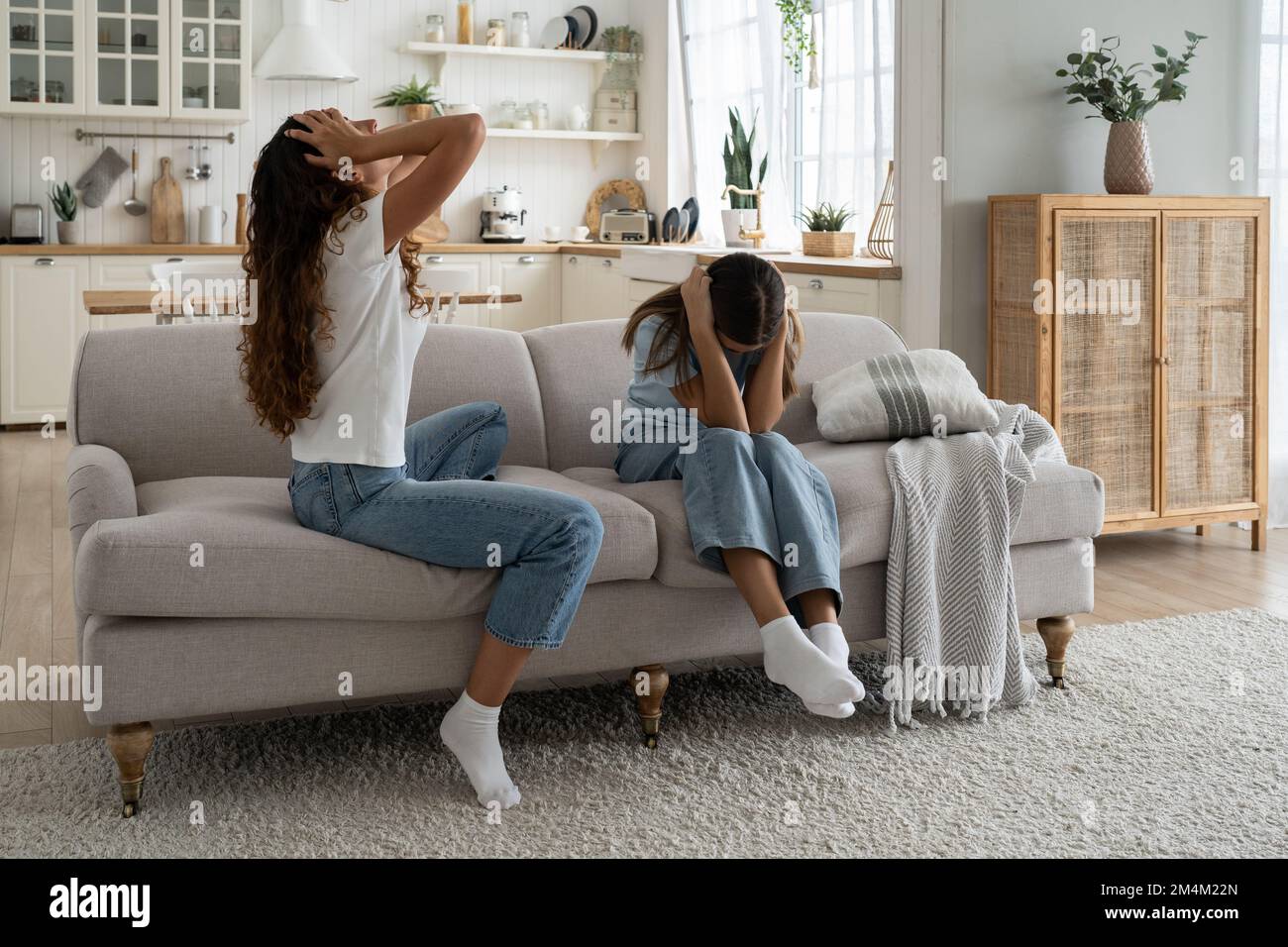 Depressed mother of difficult teen girl daughter feeling sad and ...