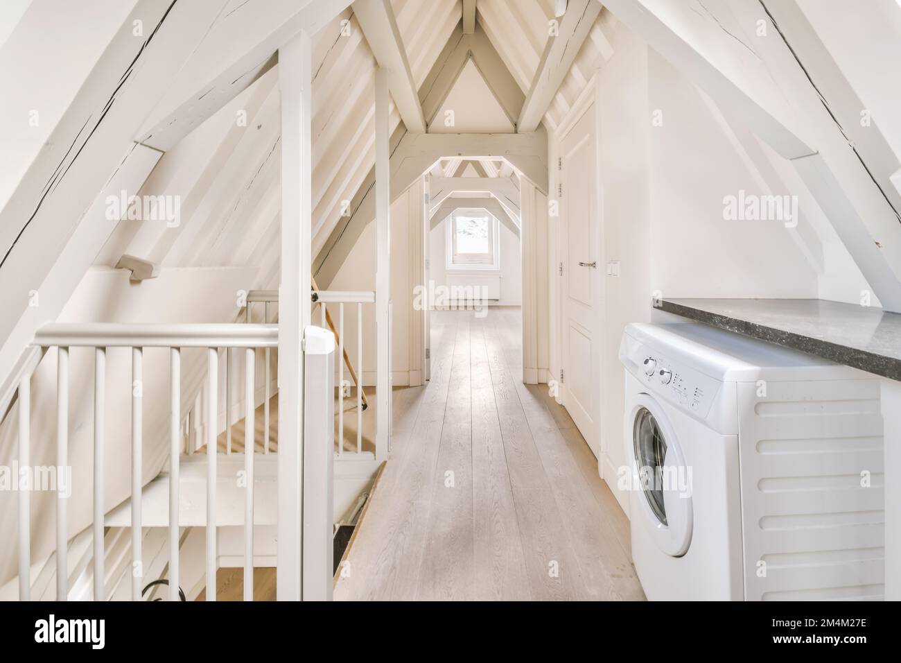 a laundry room with a washer, dryer and washing machine in the corner ...