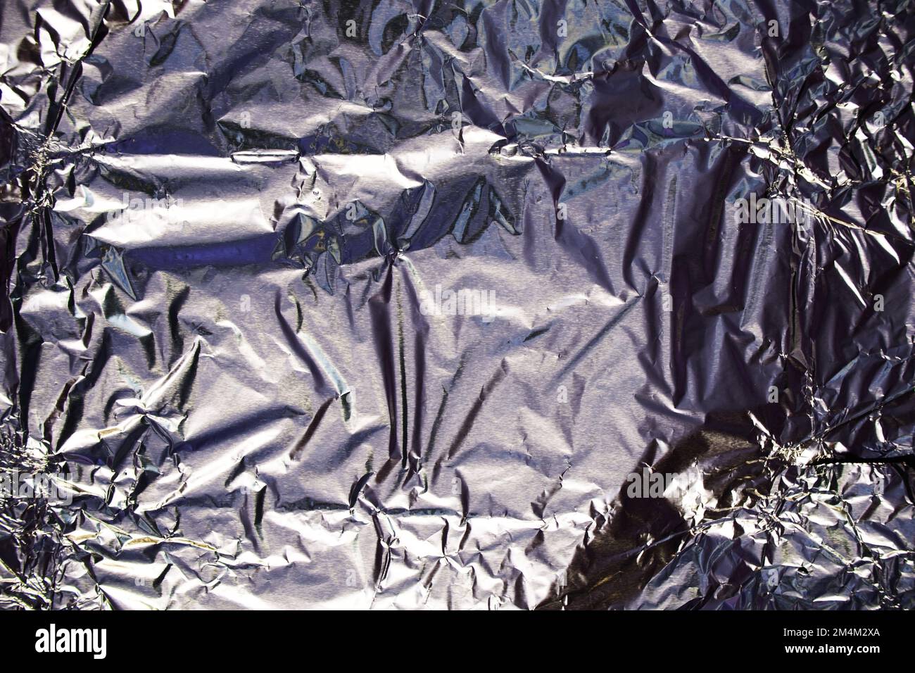 gray crumpled foil as a background close-up Stock Photo - Alamy