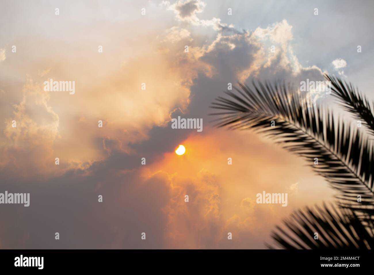 Kalamata, Greece - August 4, 2021: High red sun, as if it were setting ...