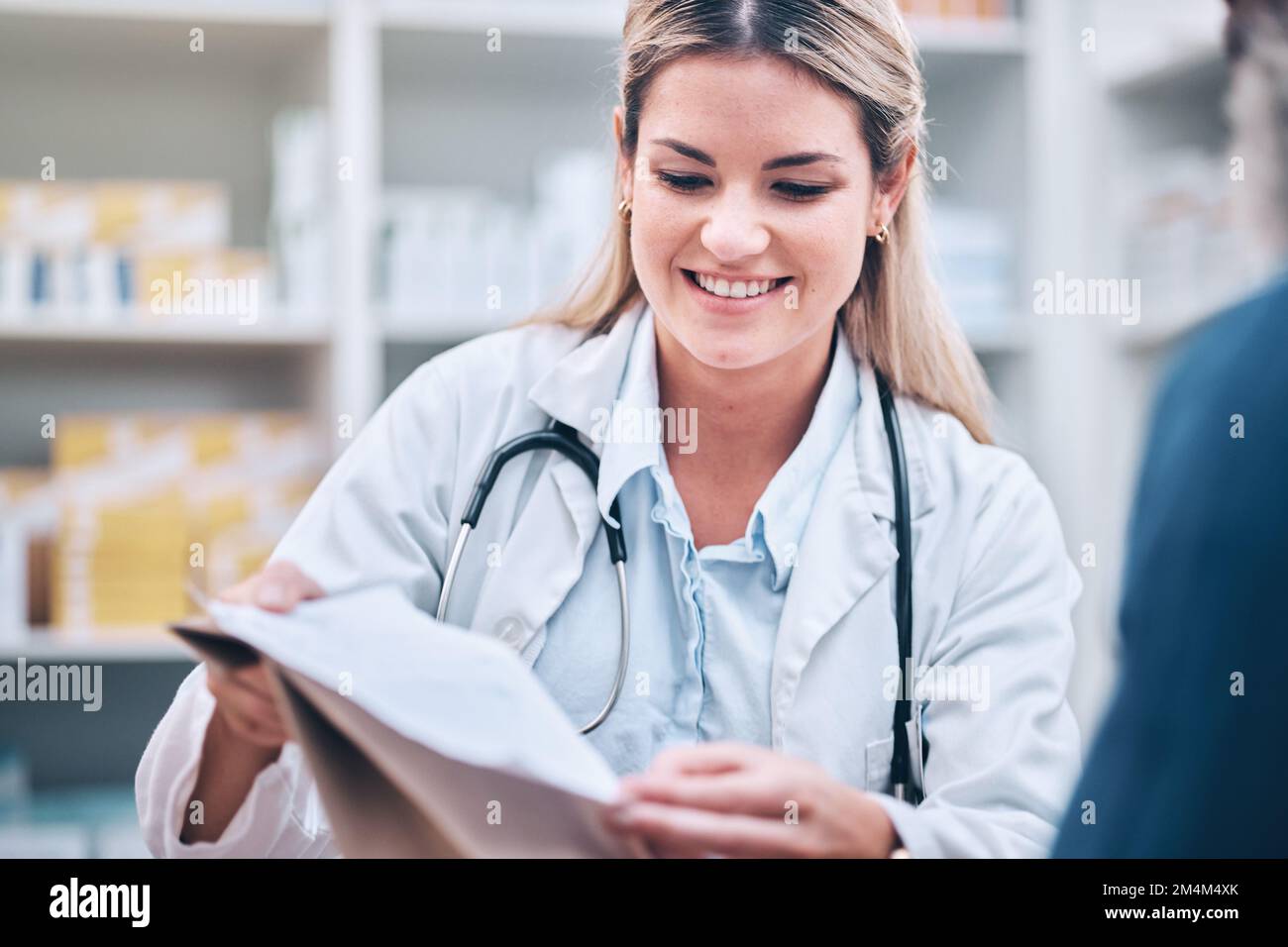 Healthcare, pharmacist and man at counter, medicine, prescription drugs ...