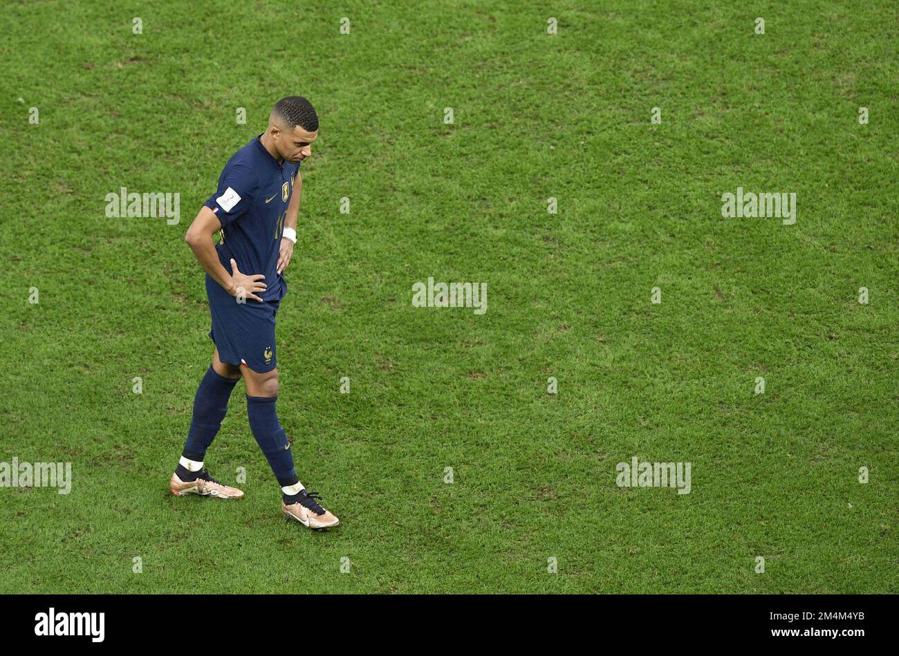 France's Kylian Mbappe looks down in disappointment after his team lost ...