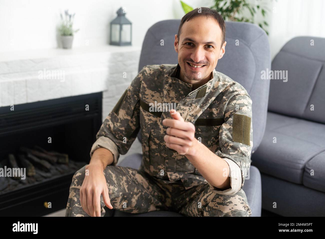 Smiling soldier on camera hi-res stock photography and images - Alamy