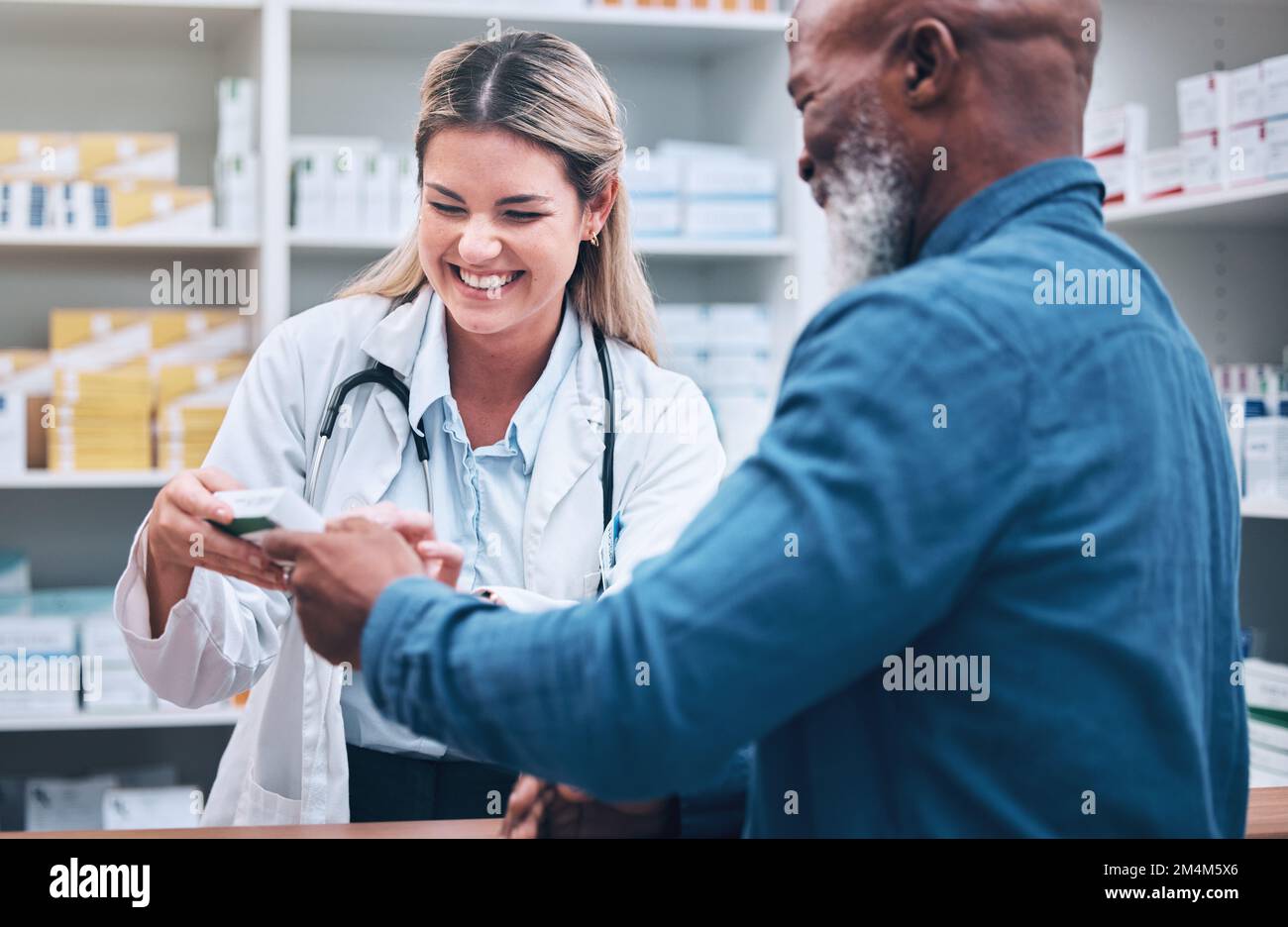 Healthcare, pharmacist and man at counter, medicine, prescription drugs ...